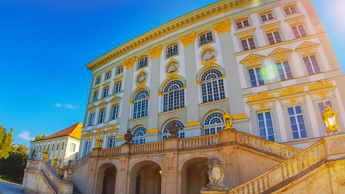 Walking past Nymphenburg Palace facade