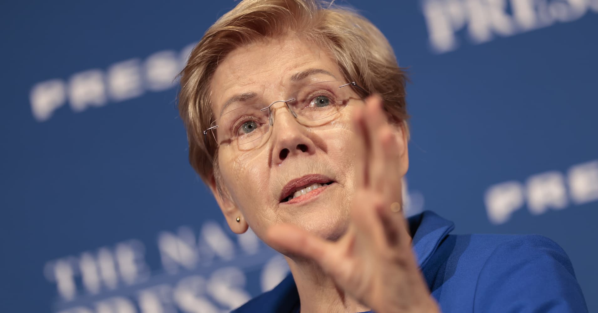 Elizabeth Warren warns of 'volatile' crypto risks in 401(k)s—here's ...