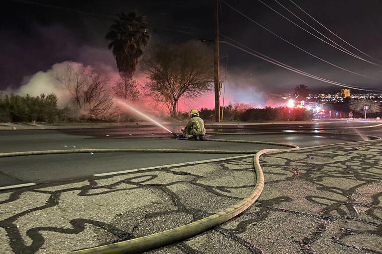 Henderson brush fire extended to nearby home, officials say