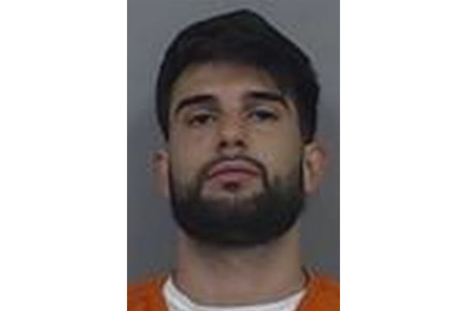 Airplane passenger who tried to open exit door, flipped off flight ...