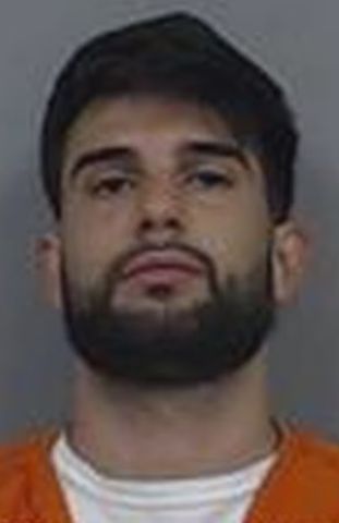 Airplane passenger who tried to open exit door, flipped off flight ...