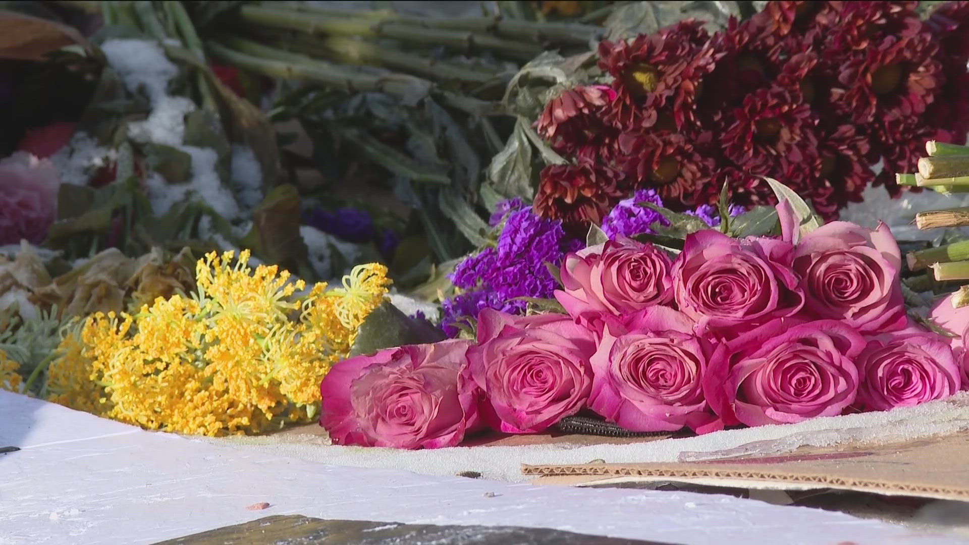 Minneapolis neighbors gather for a prayer vigil for Renee Good