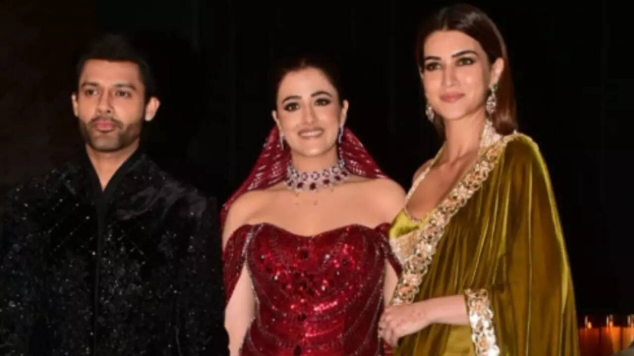 Internet melts as Kriti Sanon adjusts sister Nupur Sanon’s gown at her ...