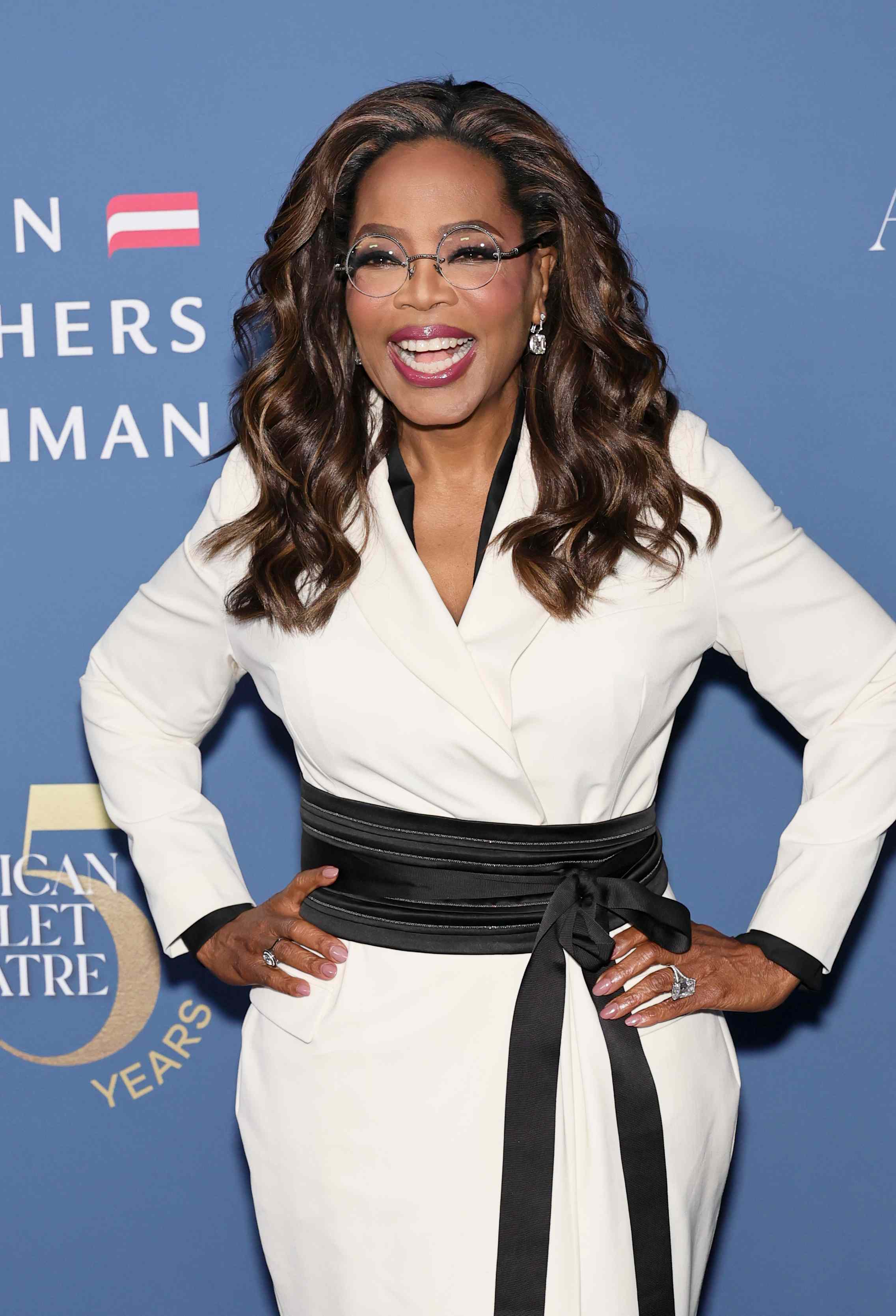 Oprah, 71, embraces winter whites in a skintight turtleneck dress with ...