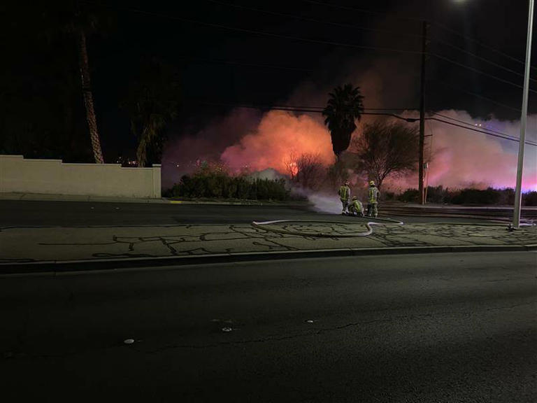Henderson brush fire extended to nearby home, officials say