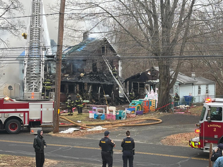 Firefighters work to put out second-alarm fire in Meriden