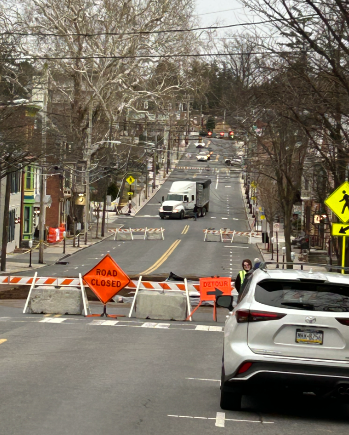 Road closed, tractor-trailer tangled in downed wires