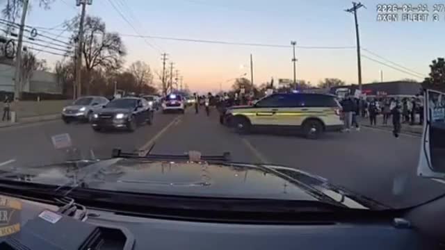 Protester 'fakes' being struck by police car during ICE demonstration