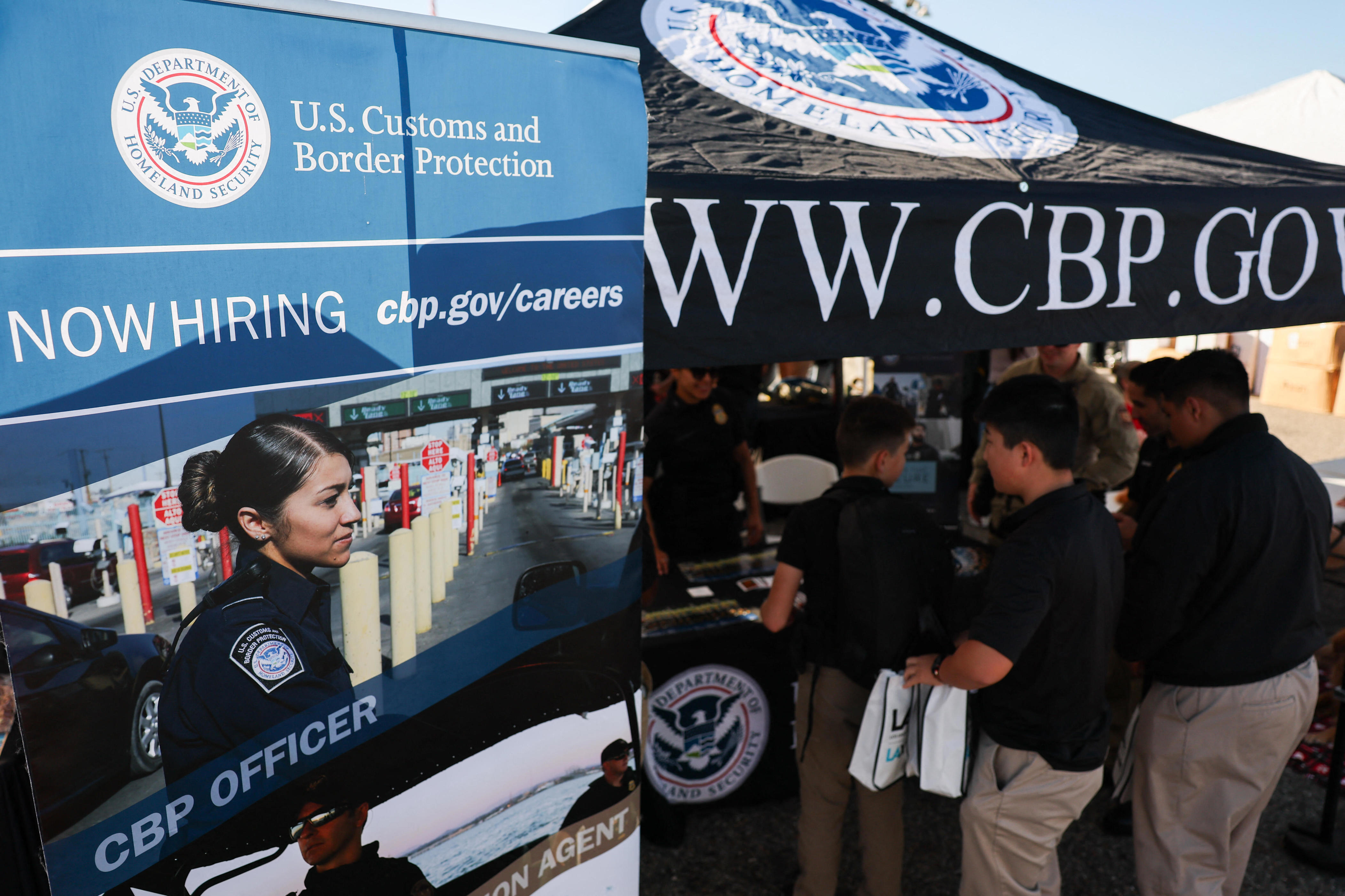 Protesters Greet Job Seekers at Florida CPB Job Fair