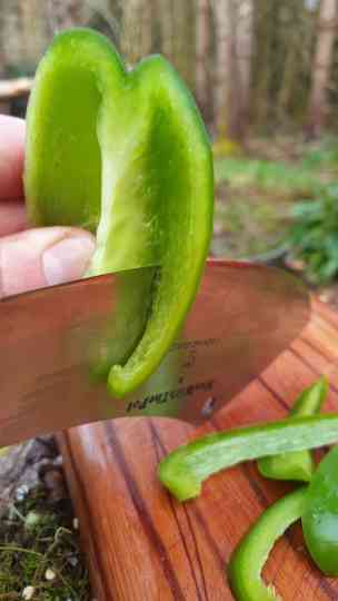 Fish curry prepared over the fire in the forest