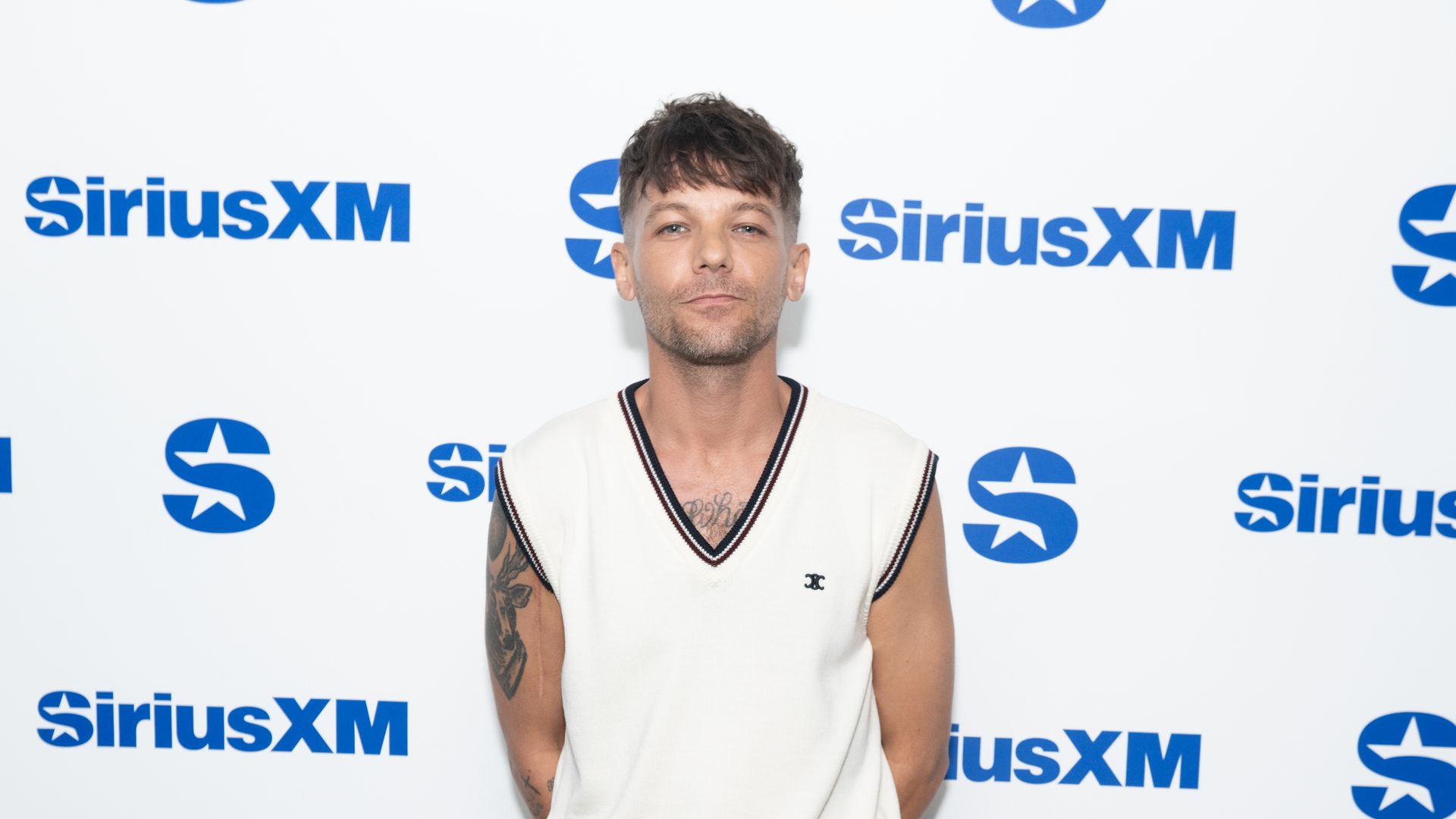 Louis Tomlinson swerves question about Zayn Malik as he praises fellow ...