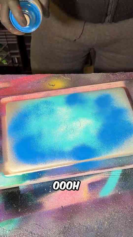 She asked a street artist to paint her laptop