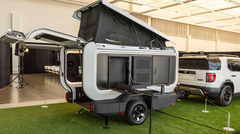 Home base: The Honda base station is a travel trailer that’s very, very ...