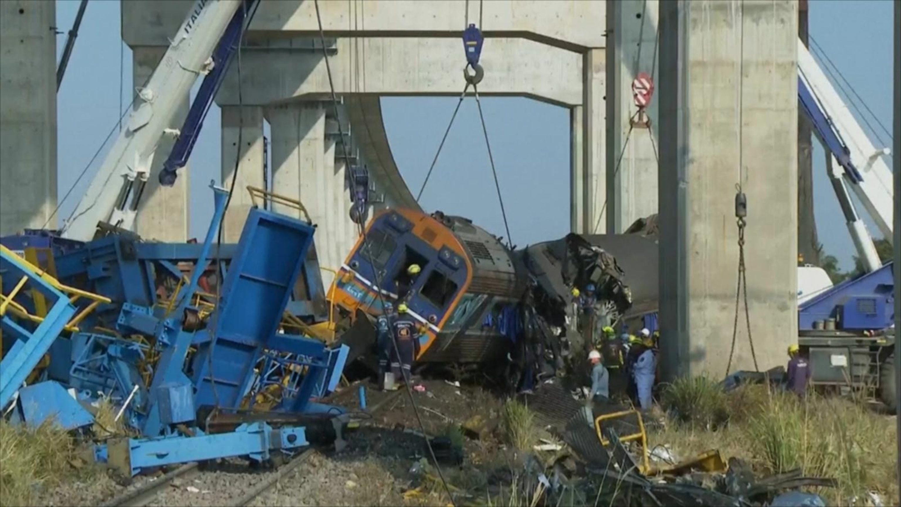 Crane falls on train in Thailand, killing 32, officials say