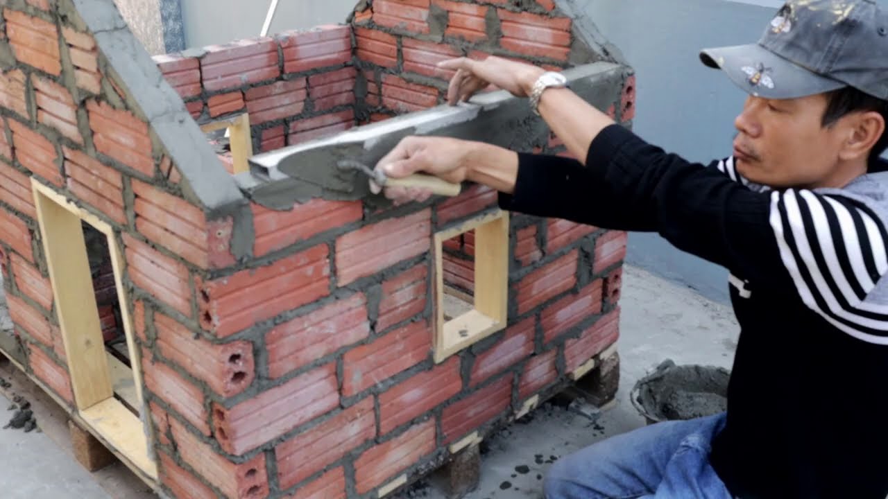 Building beautiful house puppy by cement and brick