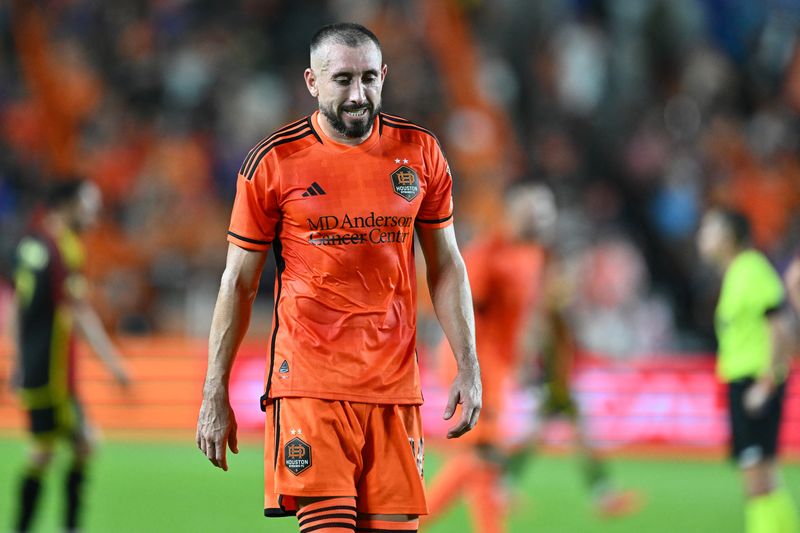 Two-time All-Star M Hector Herrera rejoins Dynamo