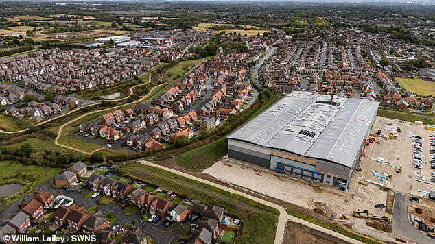 Families living in shadow of 'supersheds' kept awake by 'dystopian ...