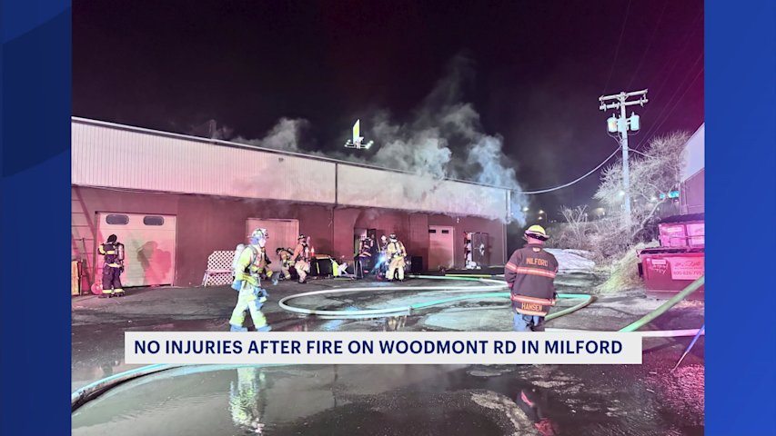 Crews respond to commercial building fire in Milford