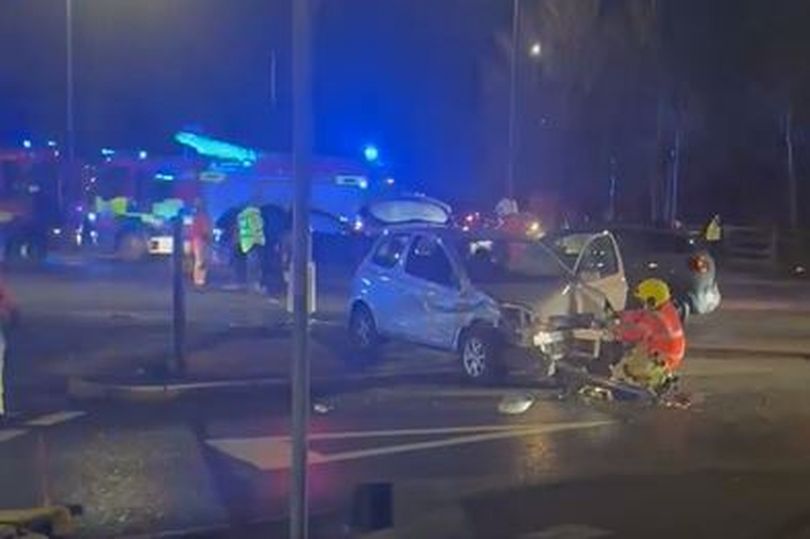 Major road closed near Manchester Airport with police at scene as car ...