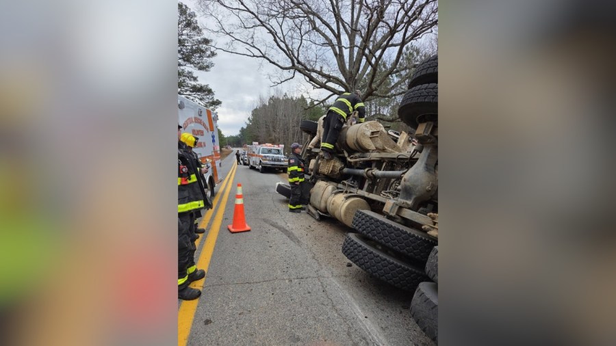 Log truck overturns in Brunswick, driver airlifted