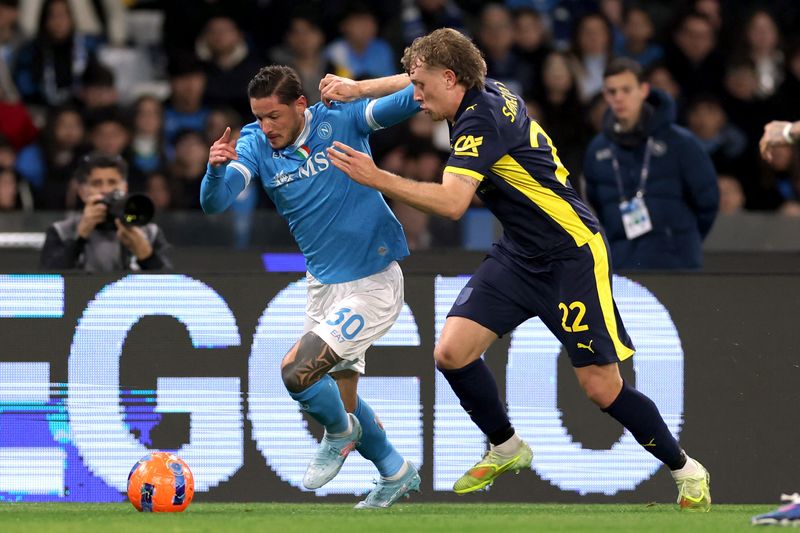 Soccer-Napoli's title defence hit by scoreless draw with Parma
