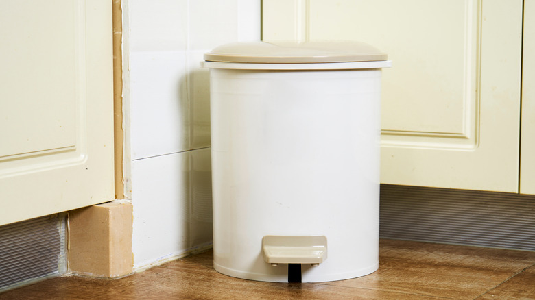 Say goodbye to the trash can scuffing up your wall with a smart solution