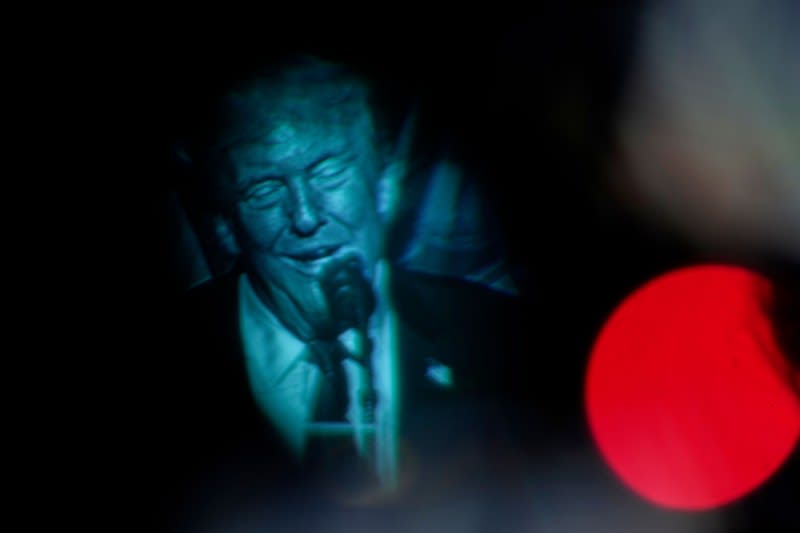 More than $430K raised for worker flipped off by Trump