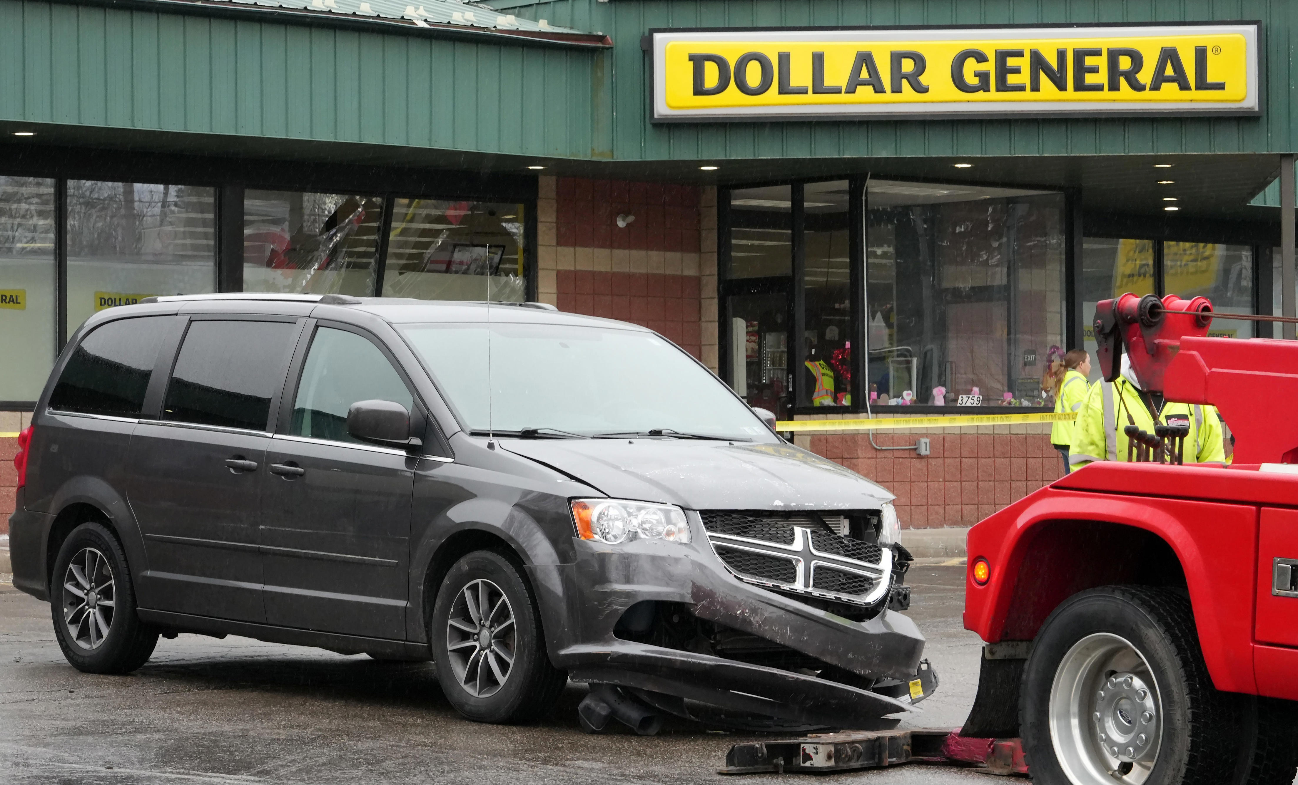 See the damage after a minivan crashes into a Dollar General store