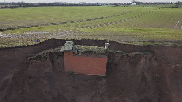Nuclear bunker precariously sat on coastal eroded cliff edge