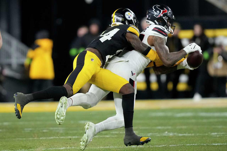 Texans receiver Nico Collins misses practice and remains in concussion ...