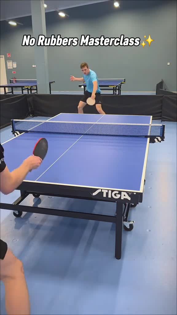 Table tennis rally with a no rubber racket challenge
