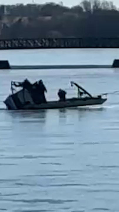 Ice fishing shacks falling through ice on Lake Poinsett