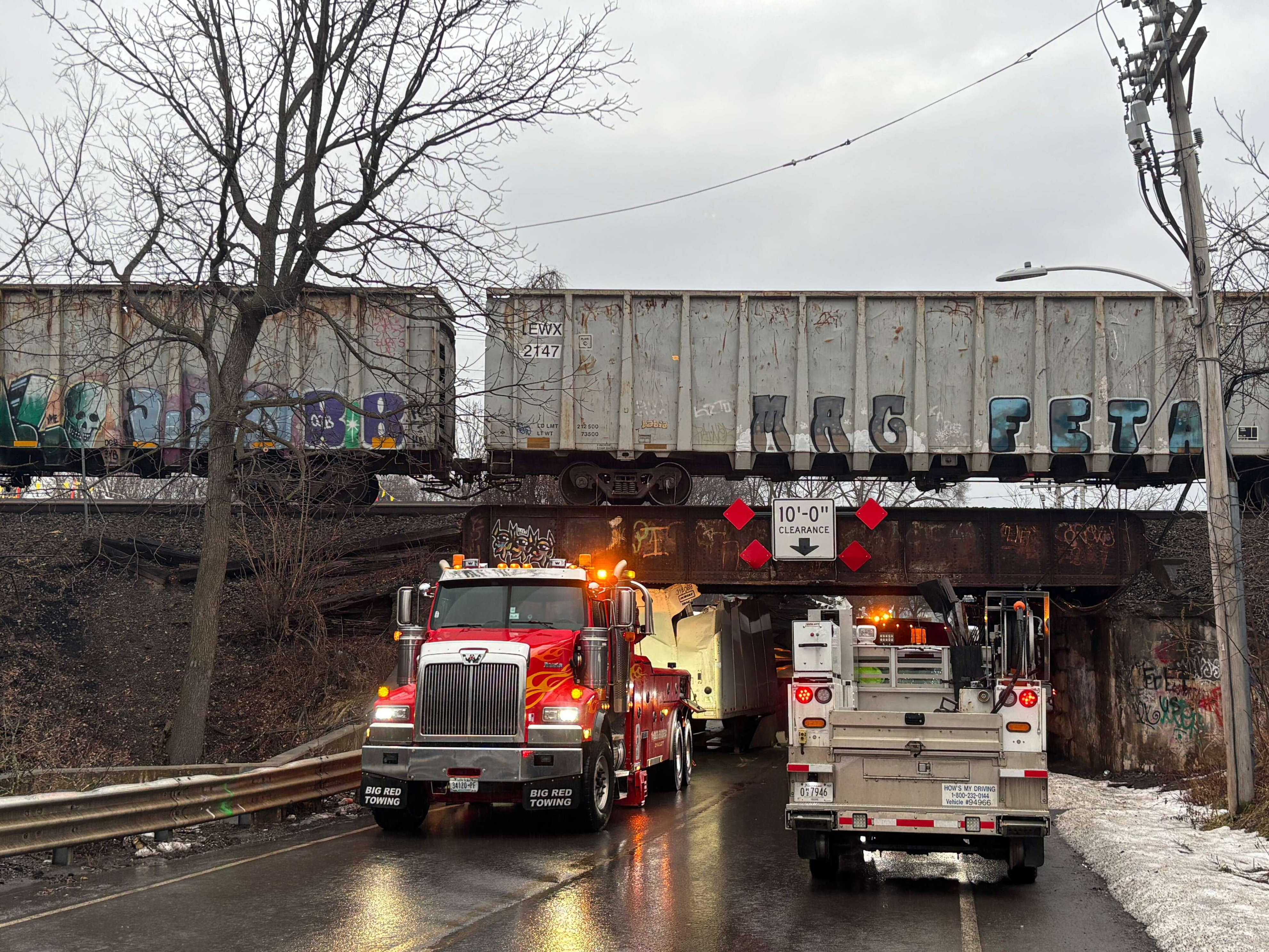 Truck’s roof ripped off after hitting railroad bridge in DeWitt