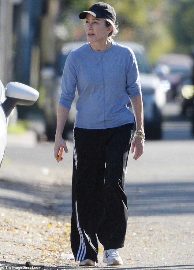 90s sitcom icon seen with husband who acted with Clint Eastwood... who ...