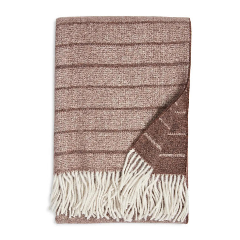 Nordstrom Rack has a soft throw blanket on sale for $25, and it’s the ...
