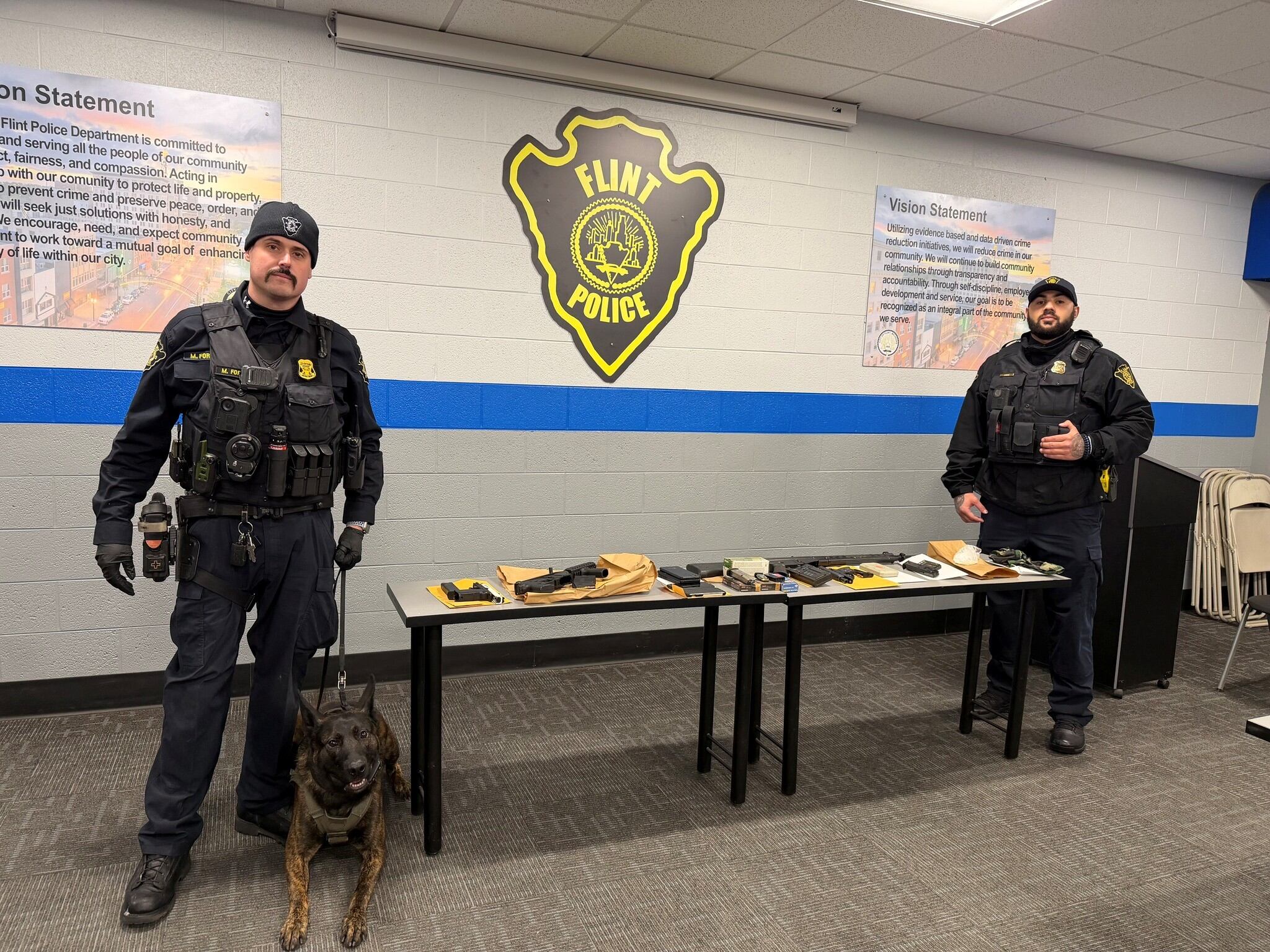 Flint police seize guns, drugs, arrest 6