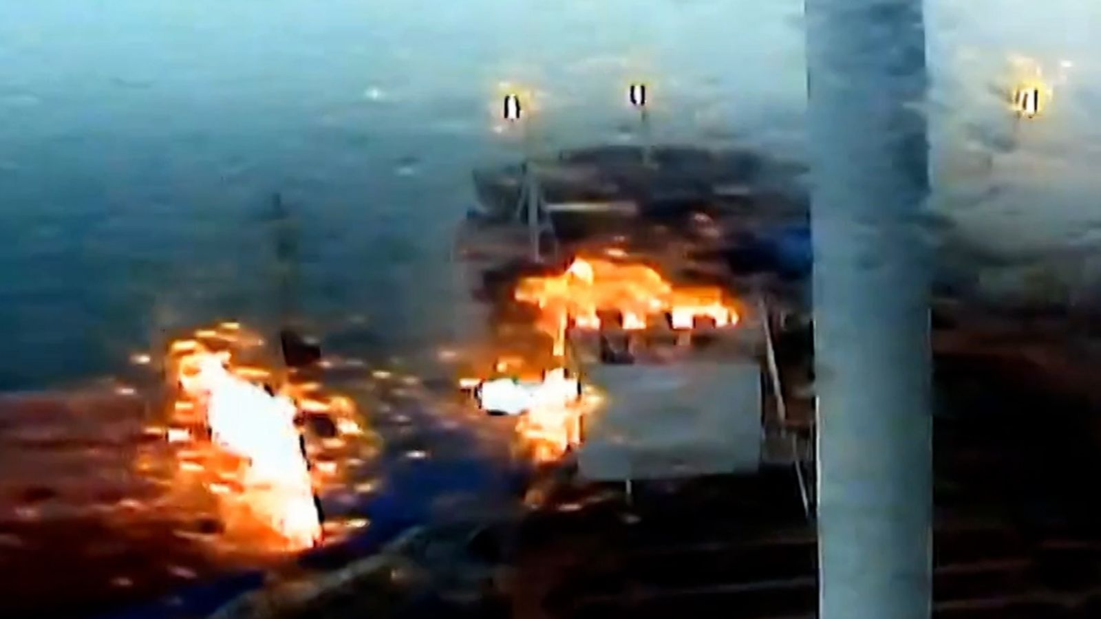 Moment container ship smashes into oil tanker