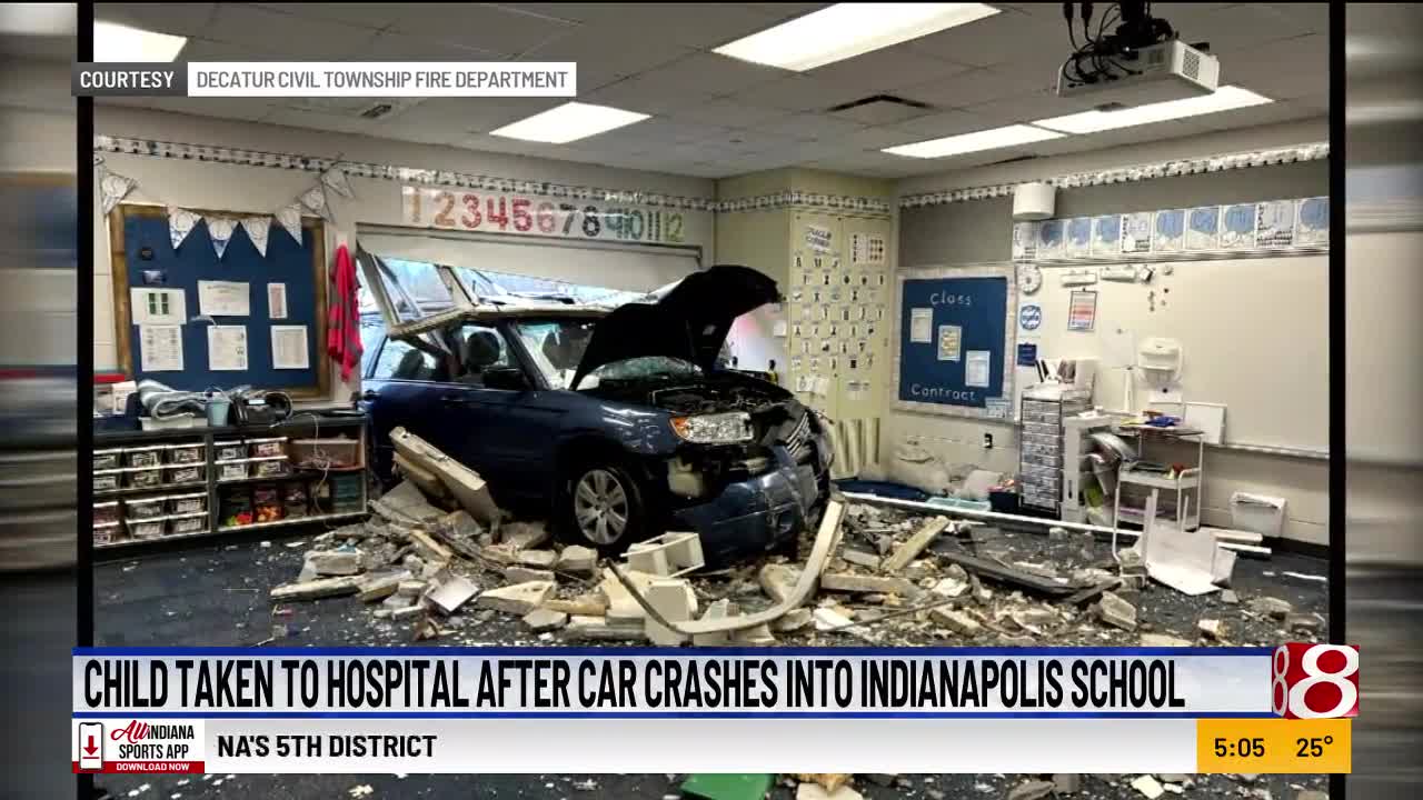 Child taken to hospital after car crashes into Indianapolis school