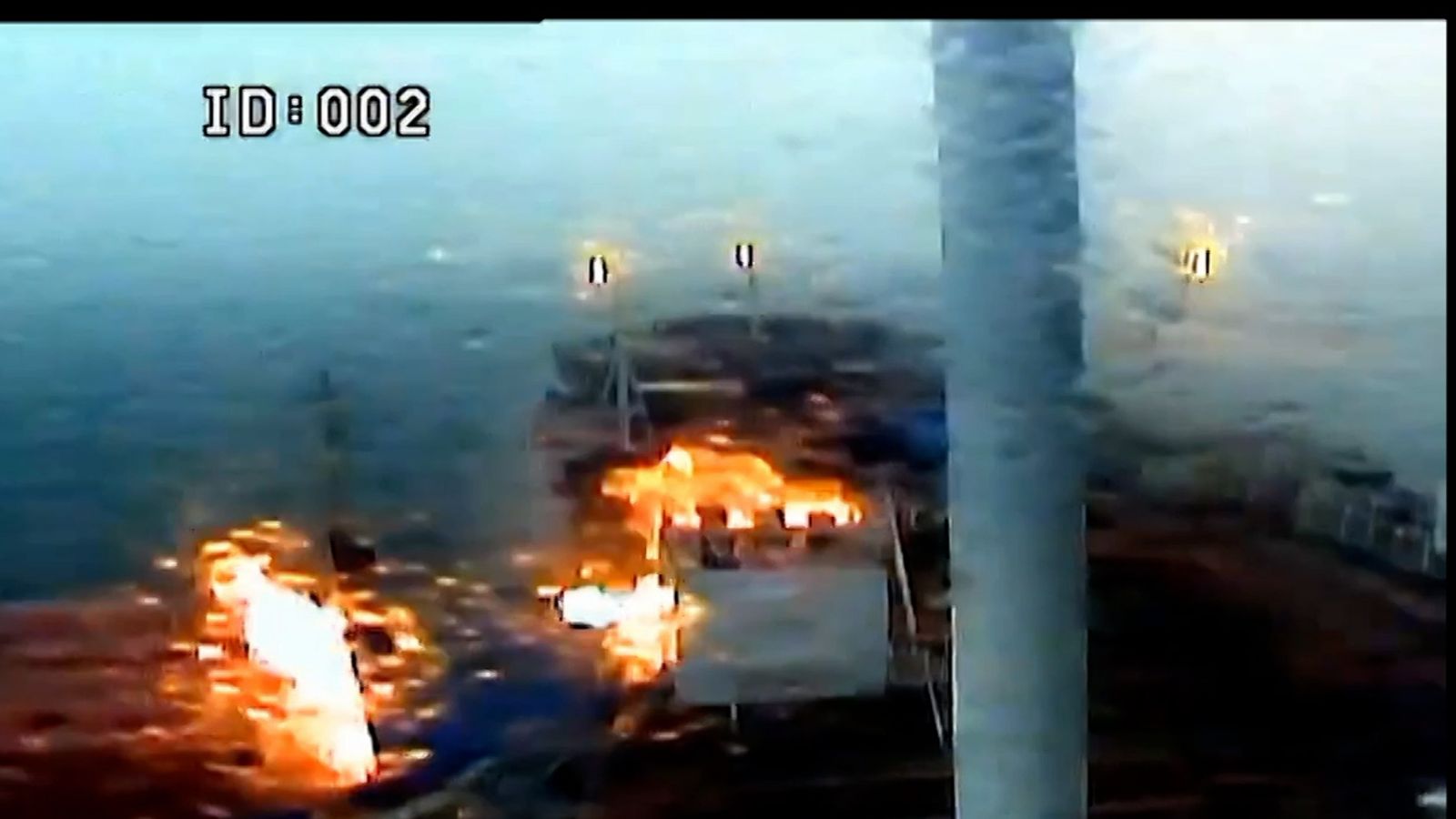 Moment container ship smashes into oil tanker