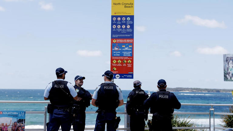 Cop’s two-word message to protesters