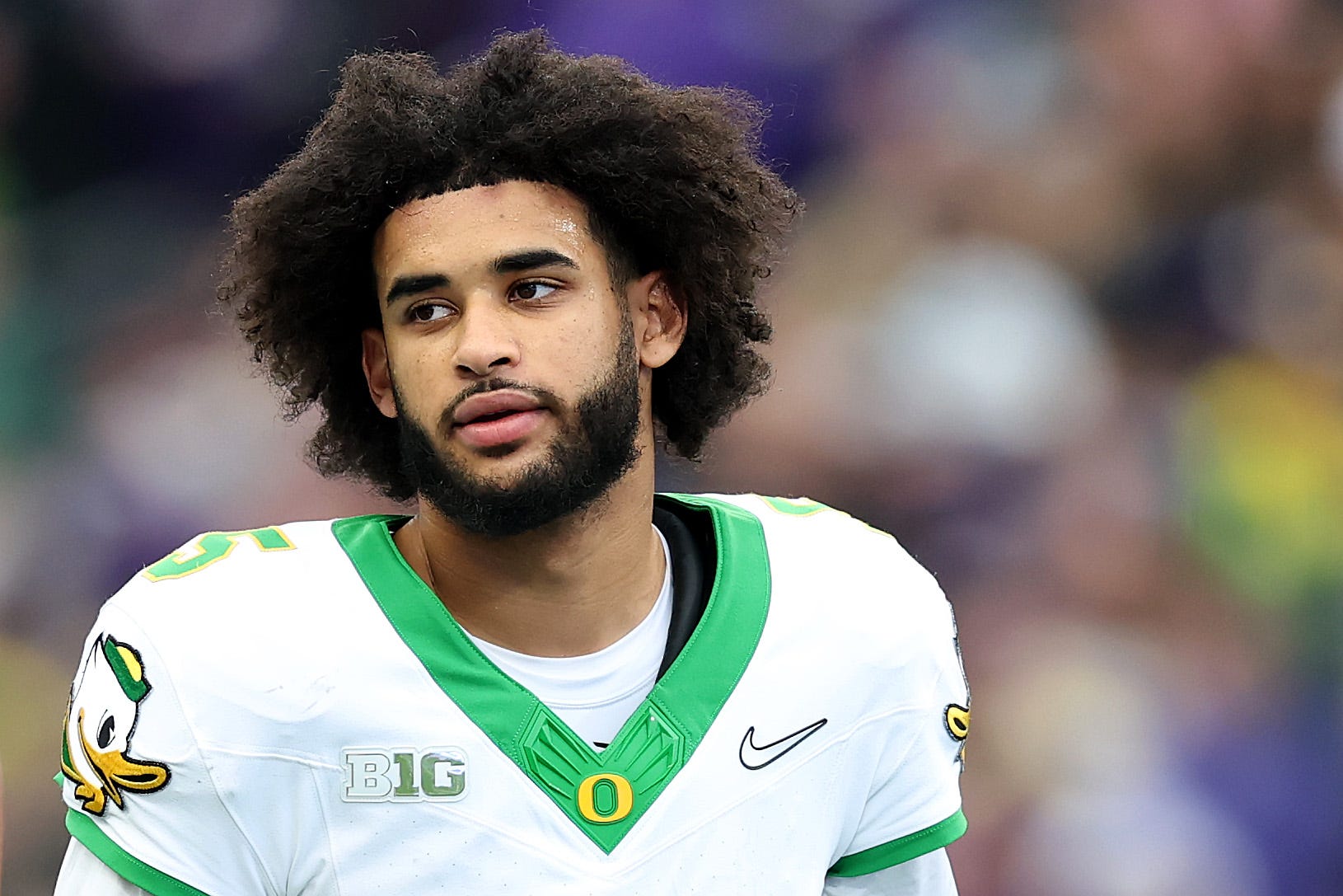 How much money did Dante Moore pass up to return to Oregon Ducks?