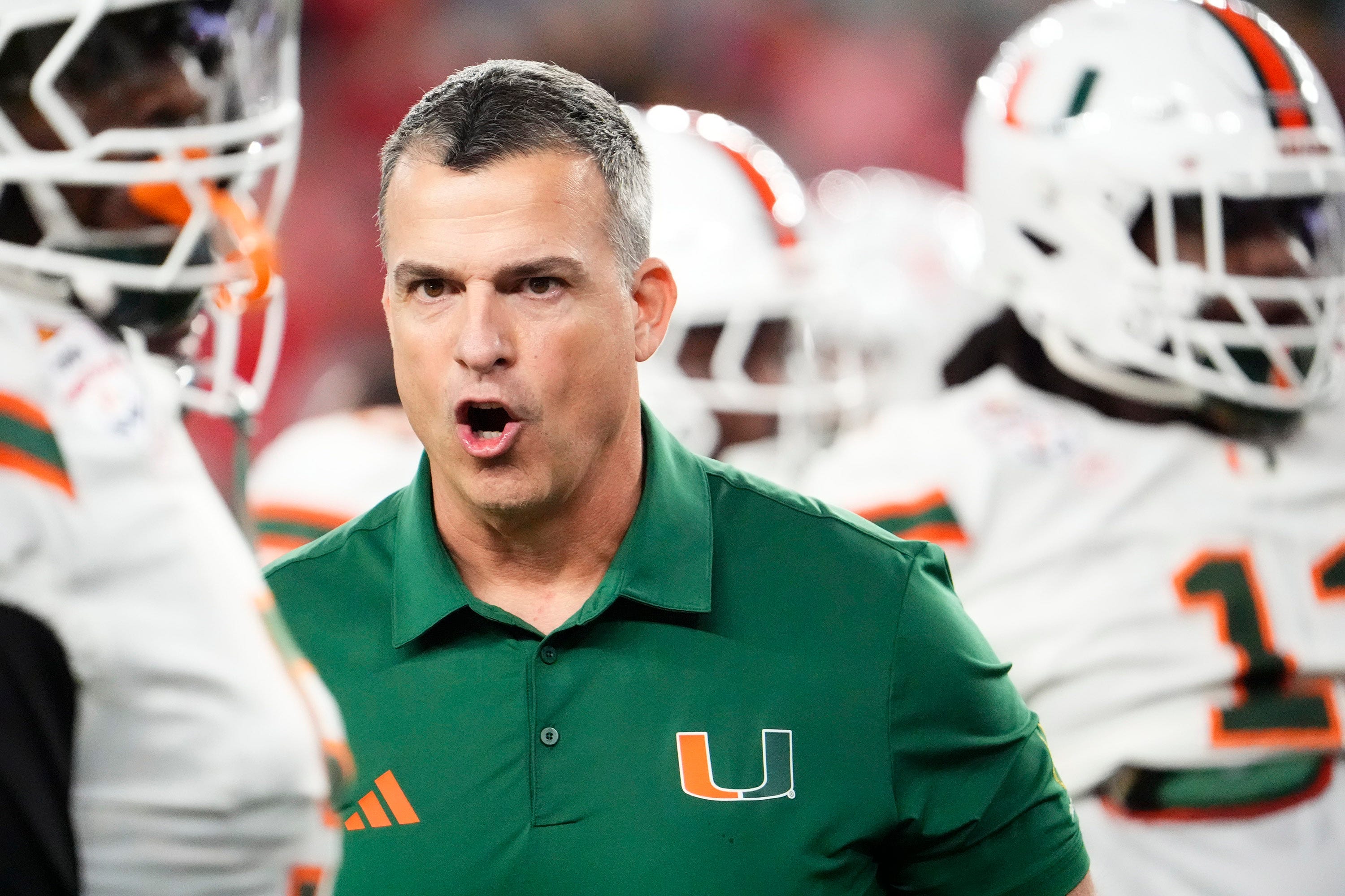 Mario Cristobal's high school football coach sees connections at Miami
