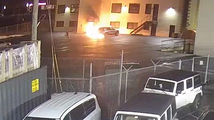 Watch: Video shows suspect set fire outside East Providence building