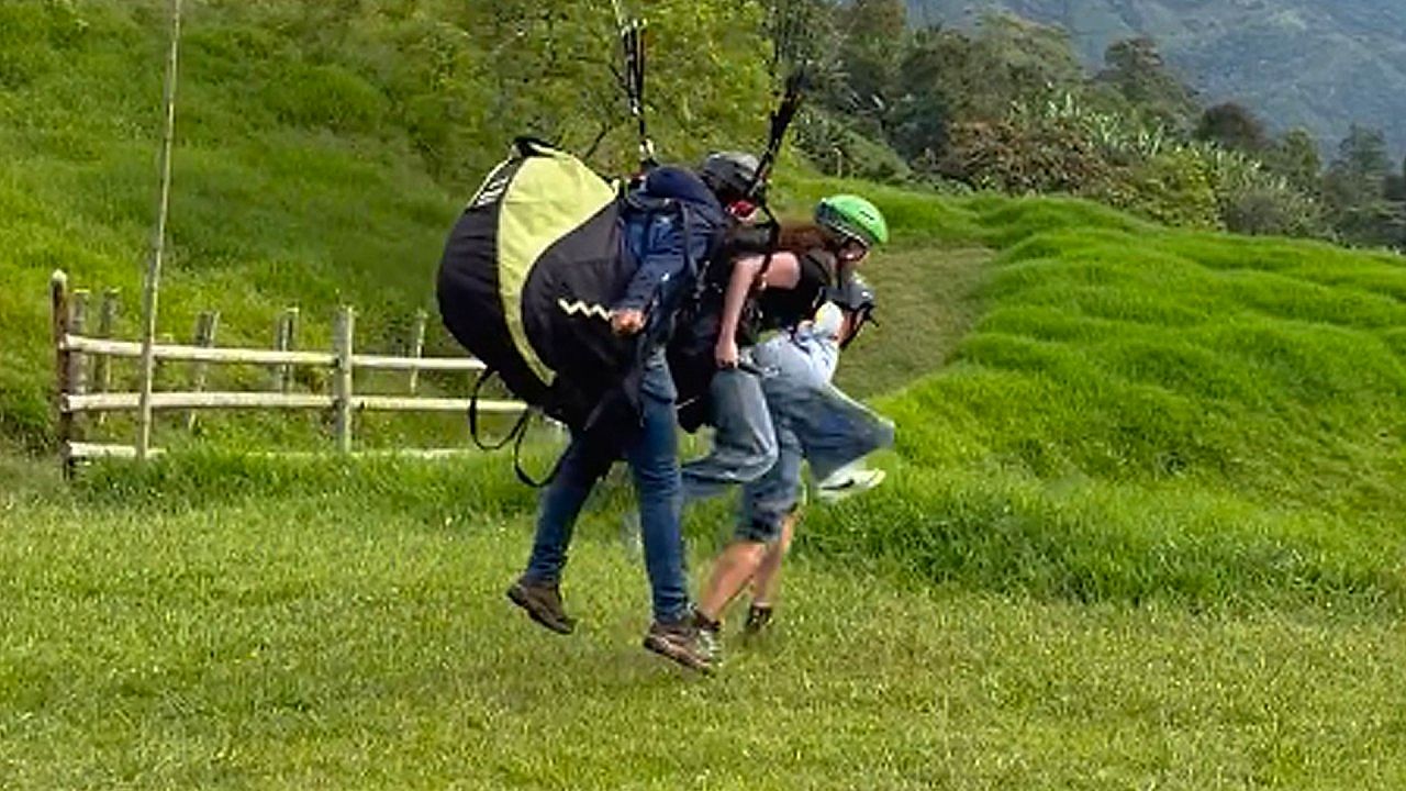 Beginner paraglider takes instructions quite literally