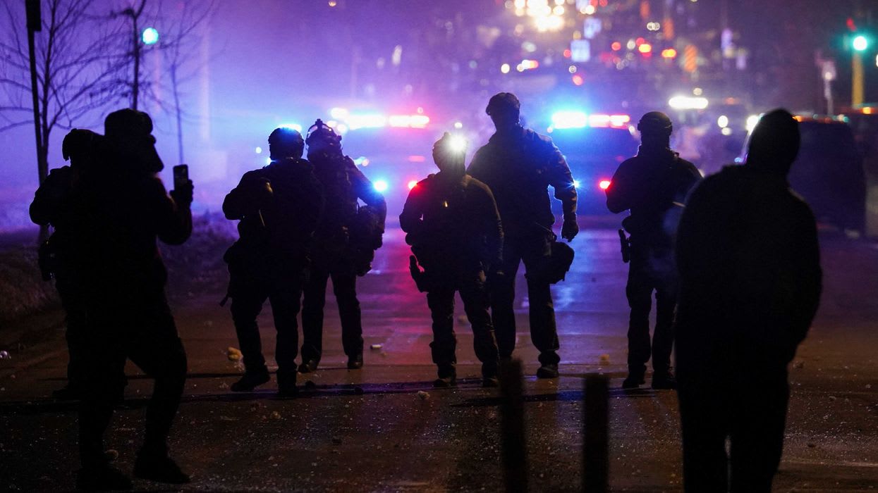 Police standoff with protesters after ICE agent shoots immigrant during ...