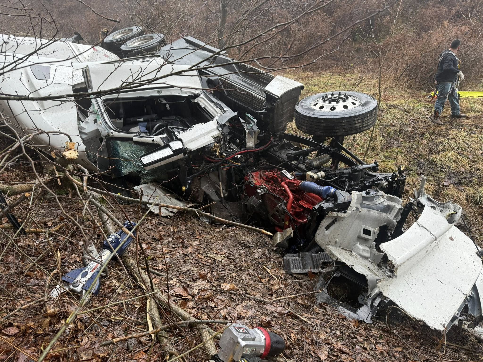 Tractor-trailer crashes nearly 40 feet over hillside in western Pa.