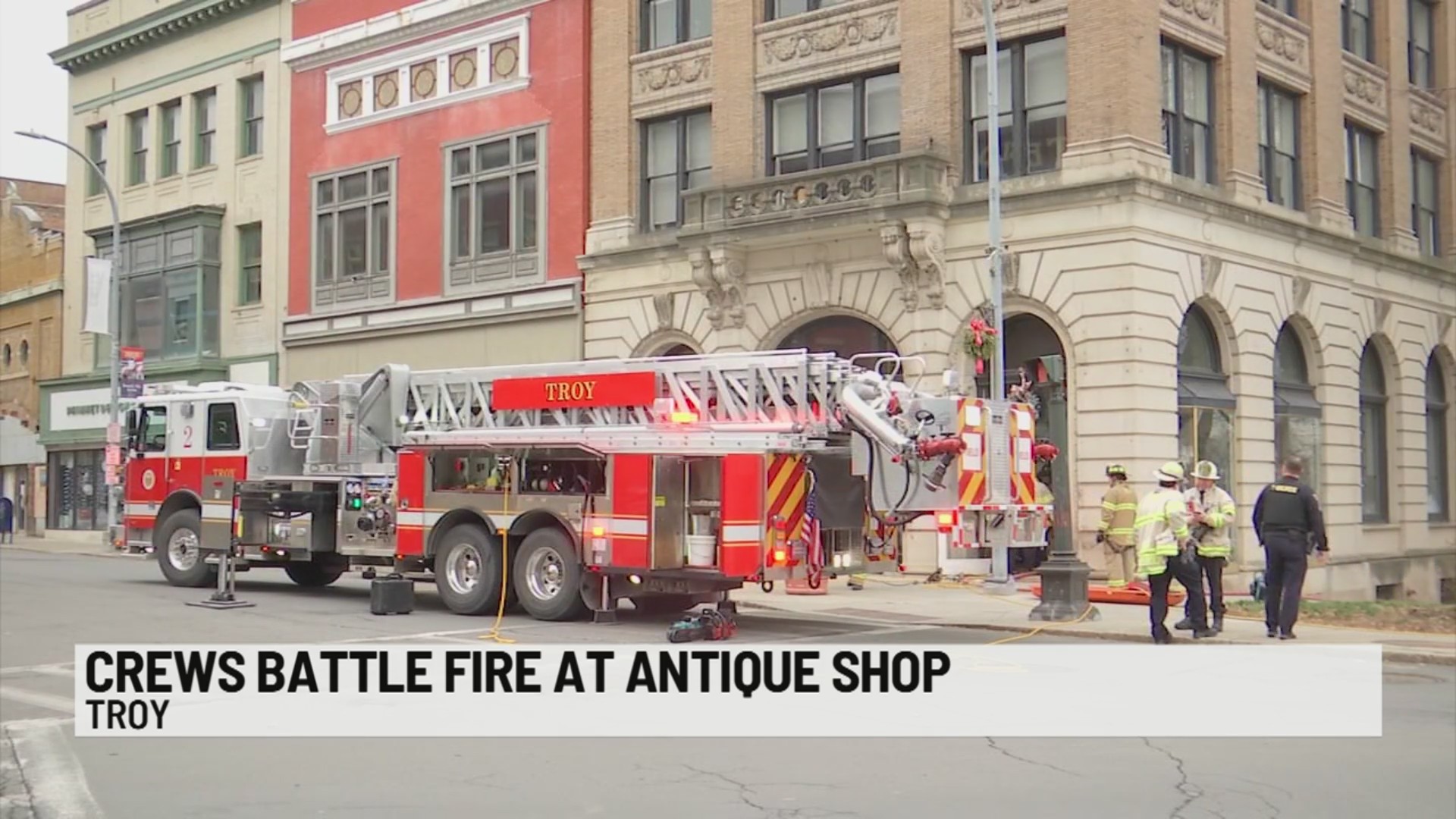 Crews battle fire at antique shop in Troy