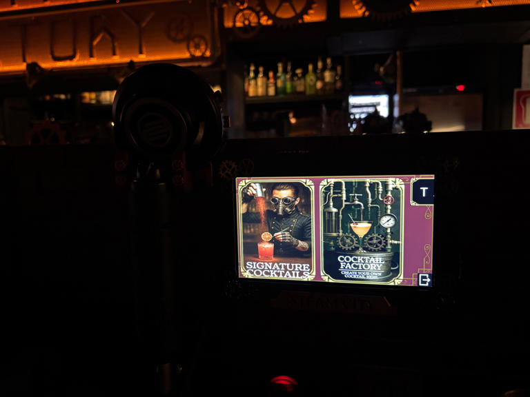 Inside the Barcelona bar where my cocktail arrived on a tiny moving train