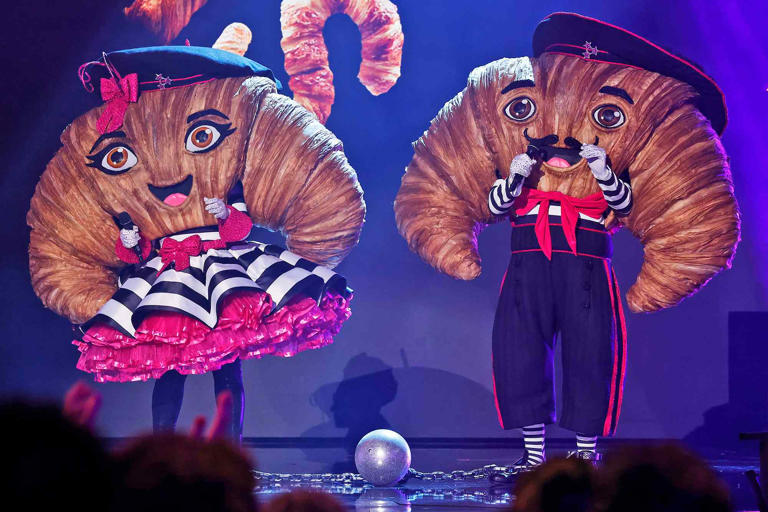 Controversial duo under 'Masked Singer' croissants masks reveal they ...