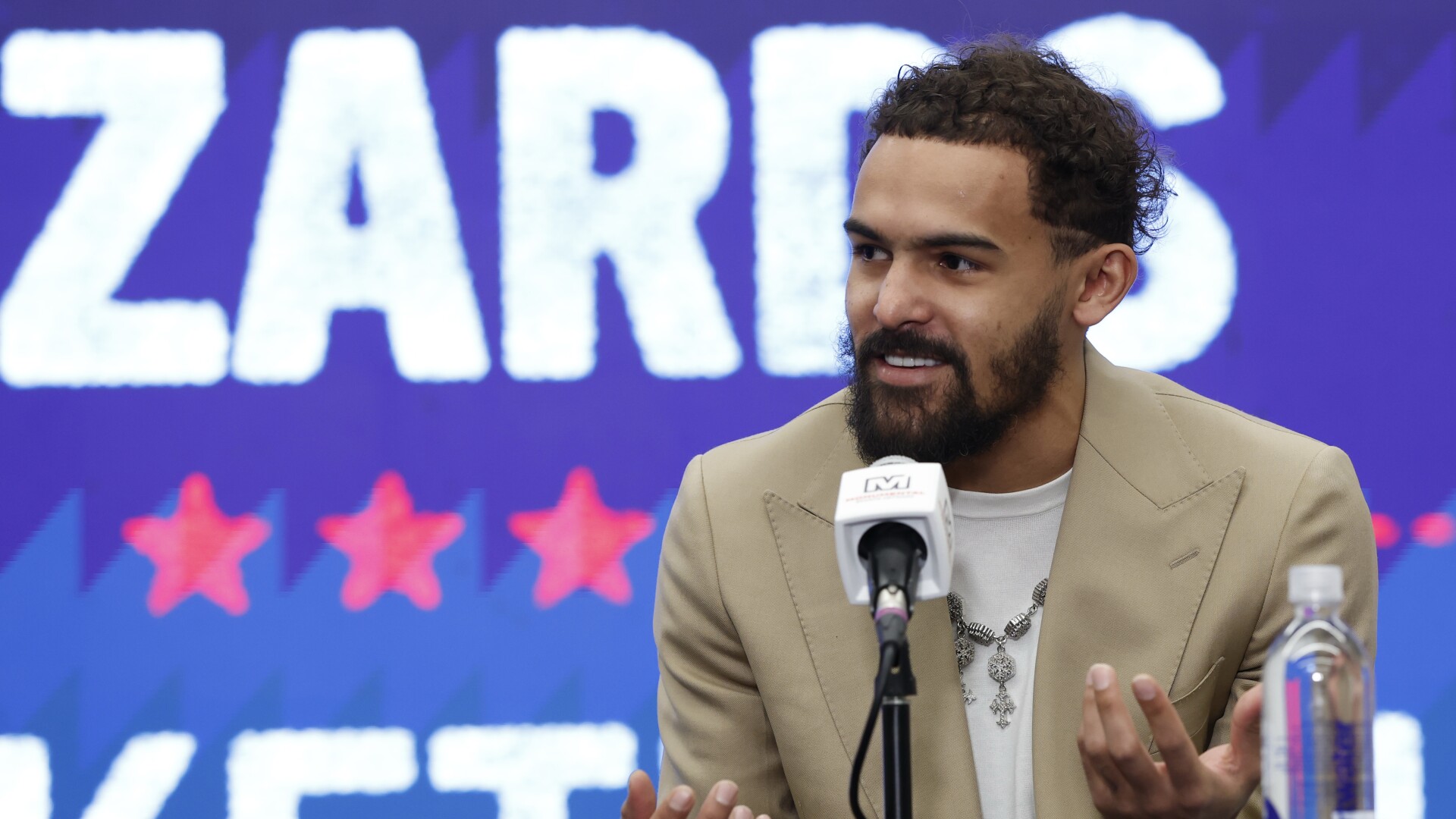 Trae Young reportedly to be out past the All-Star break with right MCL ...